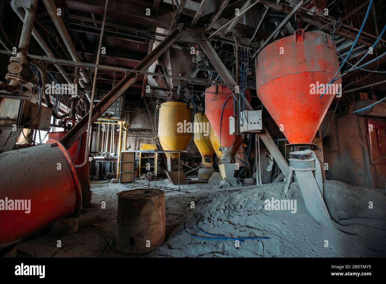 Abandoned cement and concrete factory. Old rusty hoppers Stock Photo ...