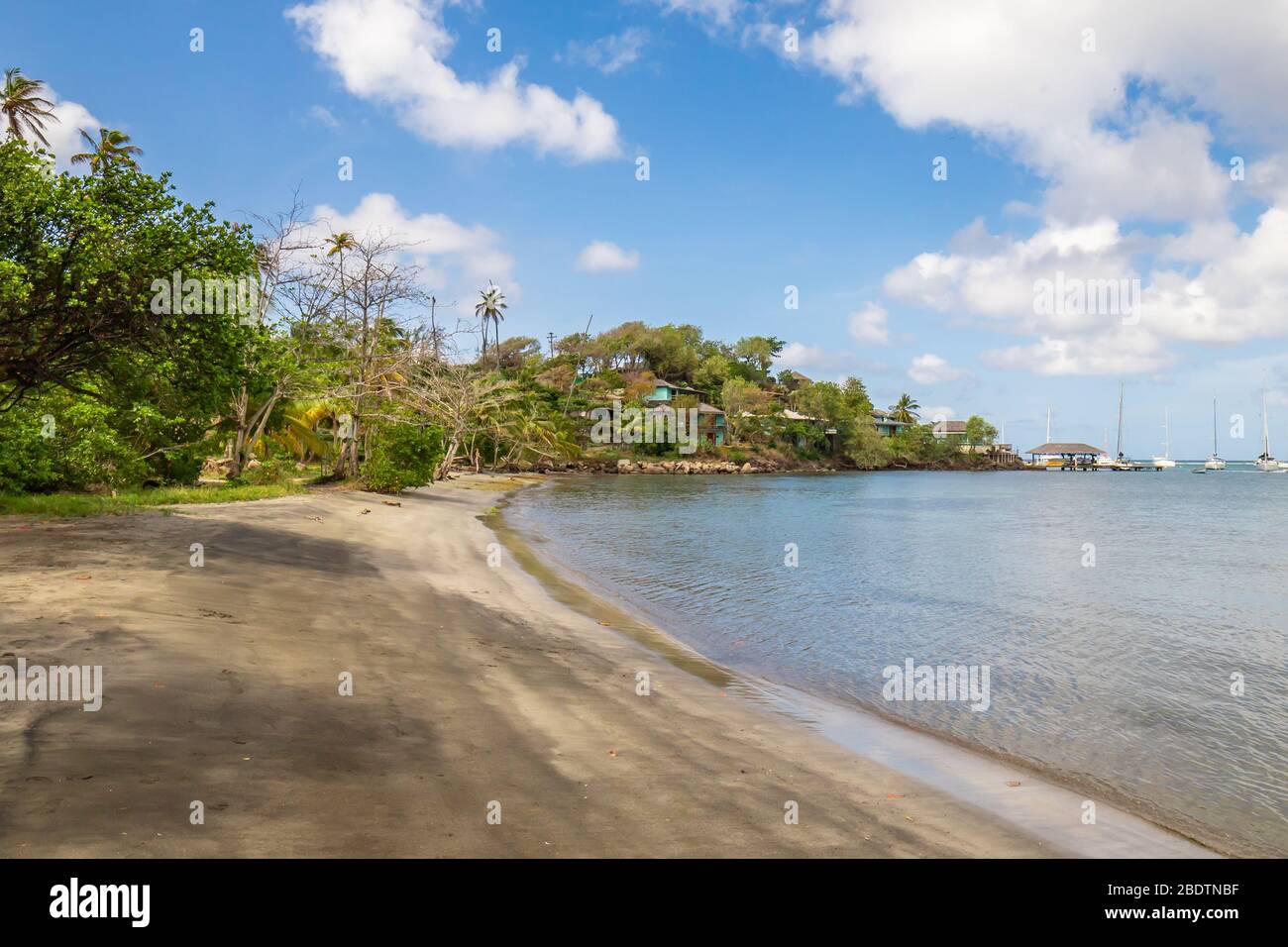Saint Vincent and the Grenadines, black sand beach in Blue Lagoon Stock ...
