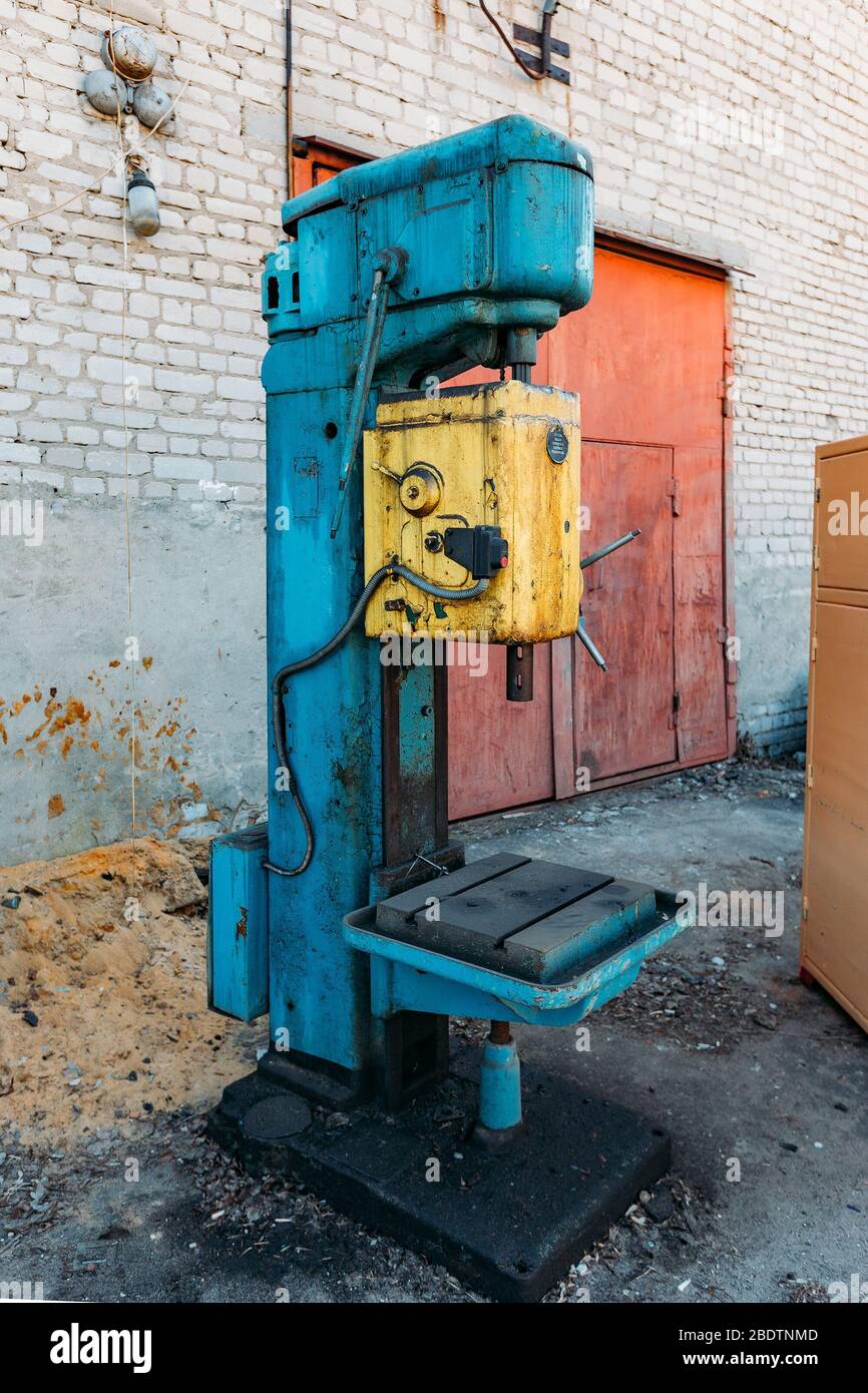 Industrial drilling machine tools in factory workshop Stock Photo - Alamy