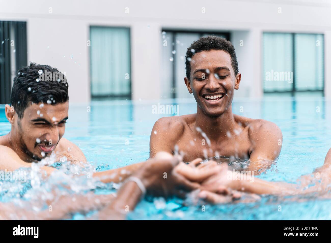 Swimmer waving hi-res stock photography and images - Alamy