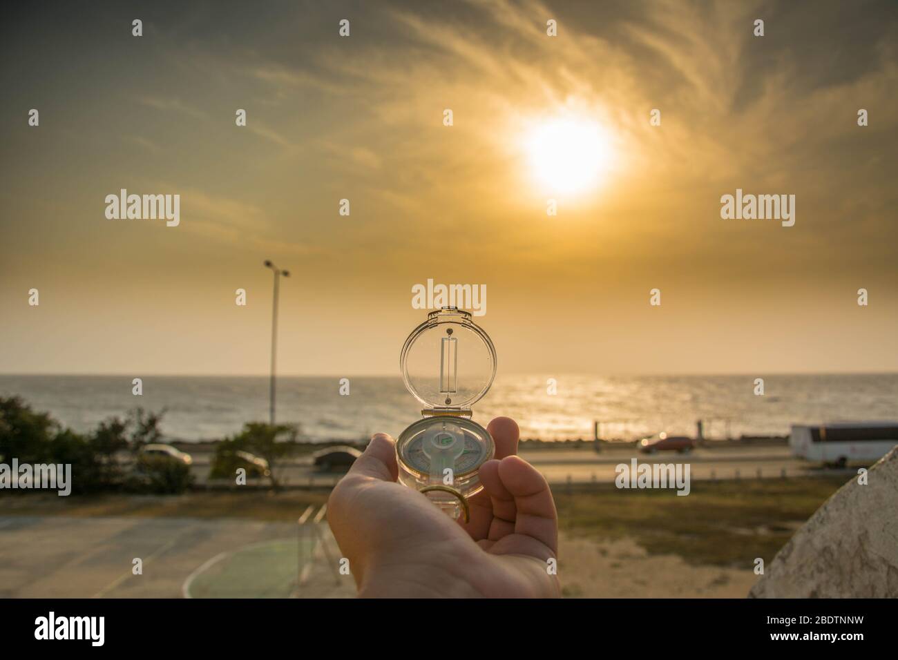 Hand compass red hi-res stock photography and images - Alamy