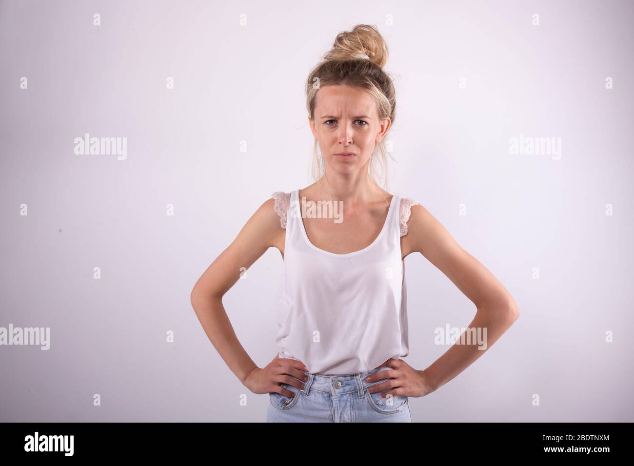Upset hands on waist hi-res stock photography and images - Alamy