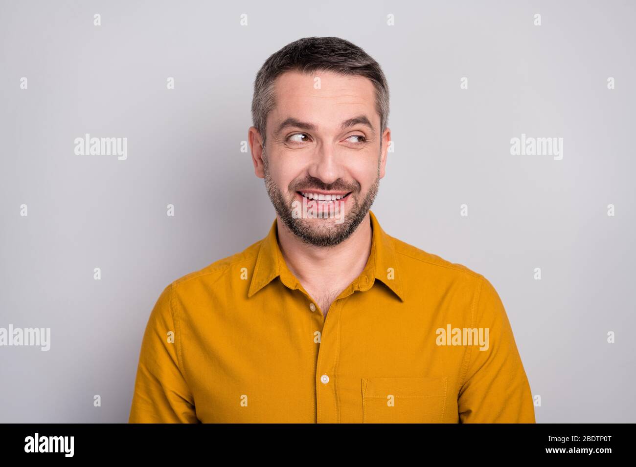 Portrait of charming mature man look copyspace listen colleagues ...