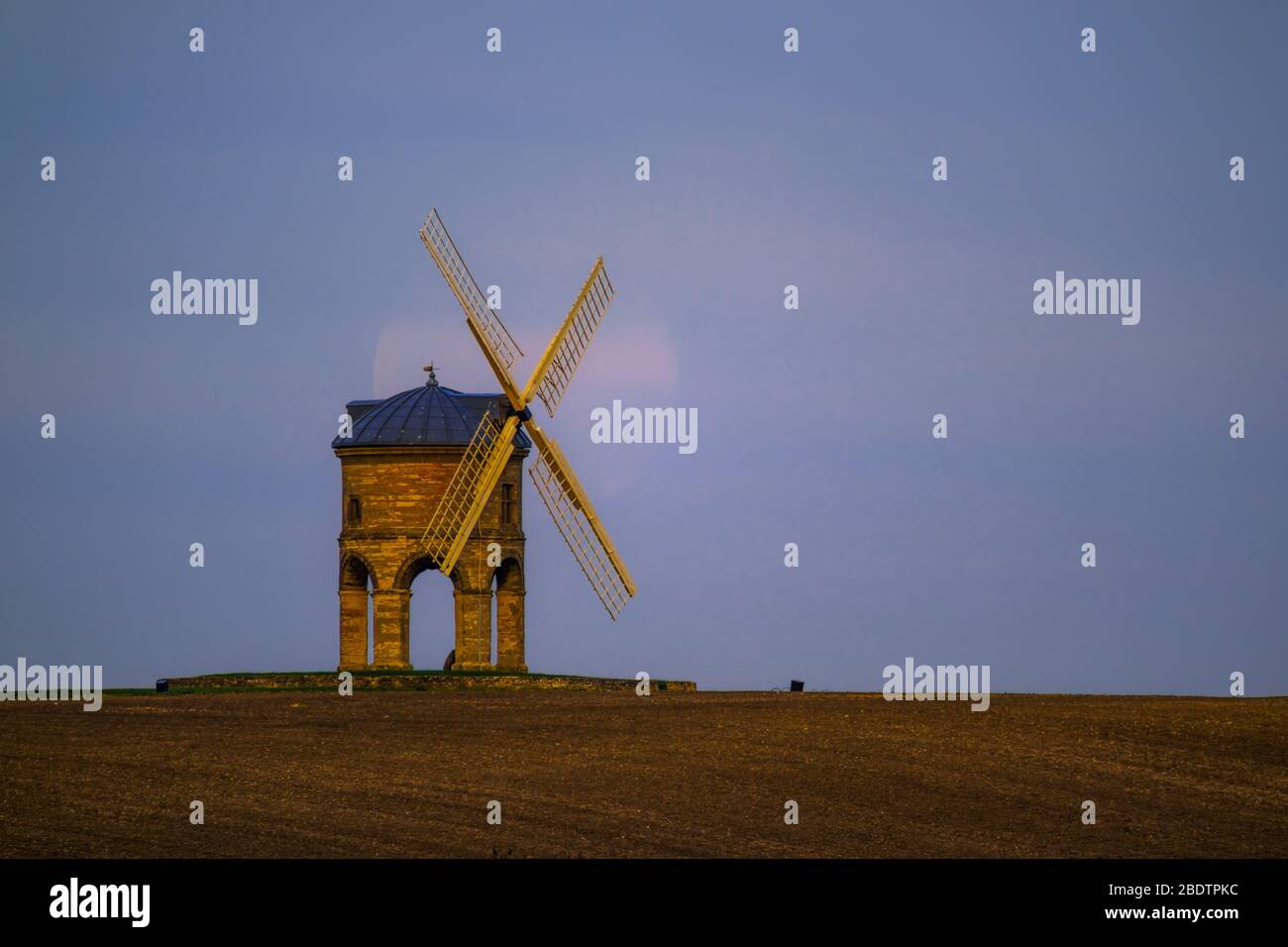 Full moon (supermoon) rising behind Chesterton Windmill, Warwickshire ...