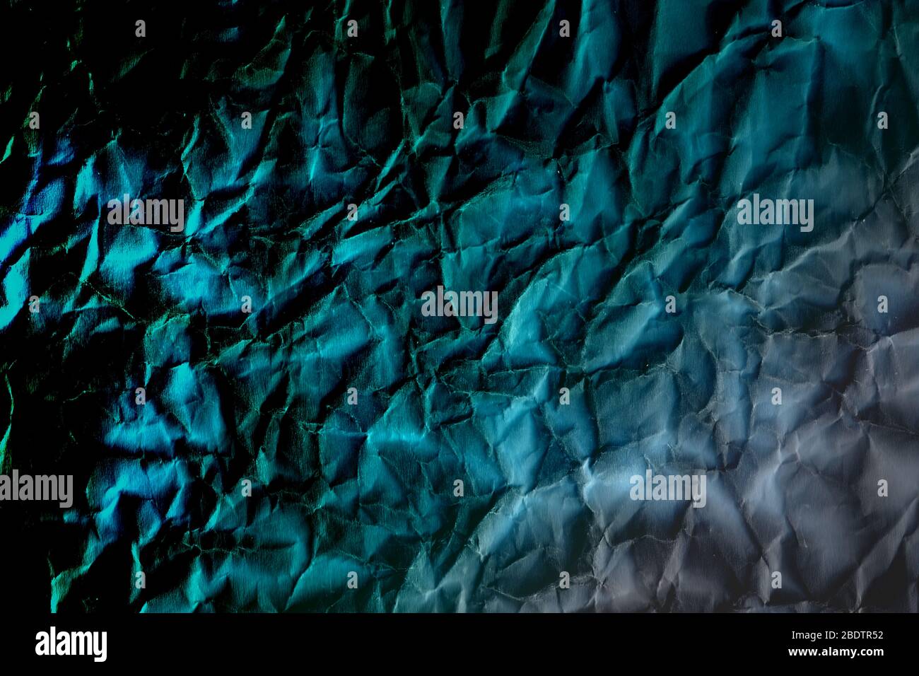 Wrinkled blue and black texture. background concept Stock Photo - Alamy