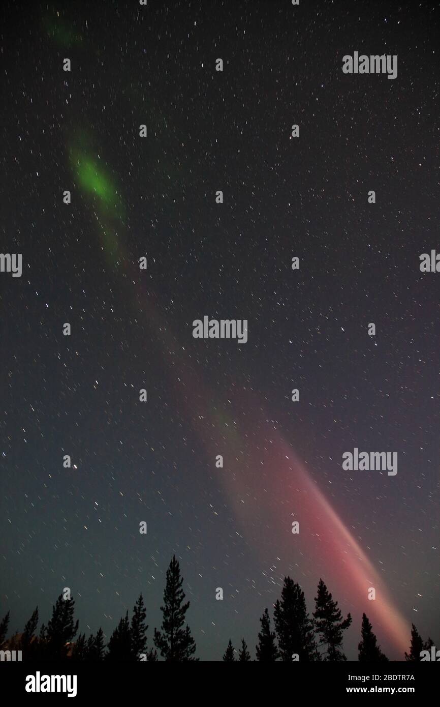 Green and red polar lights Stock Photo - Alamy