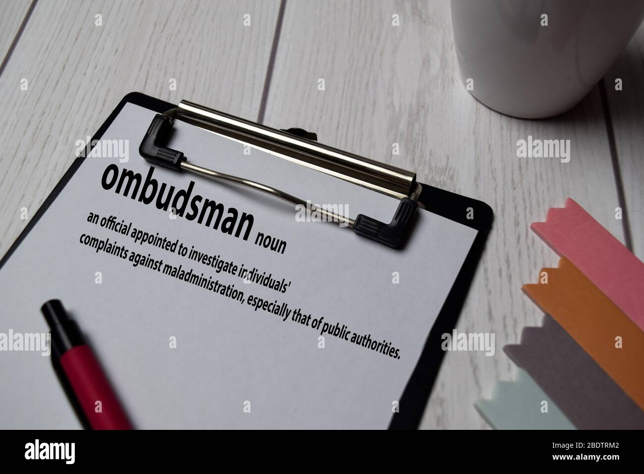 Definition of Ombudsman word with a meaning on a book. dictionary ...