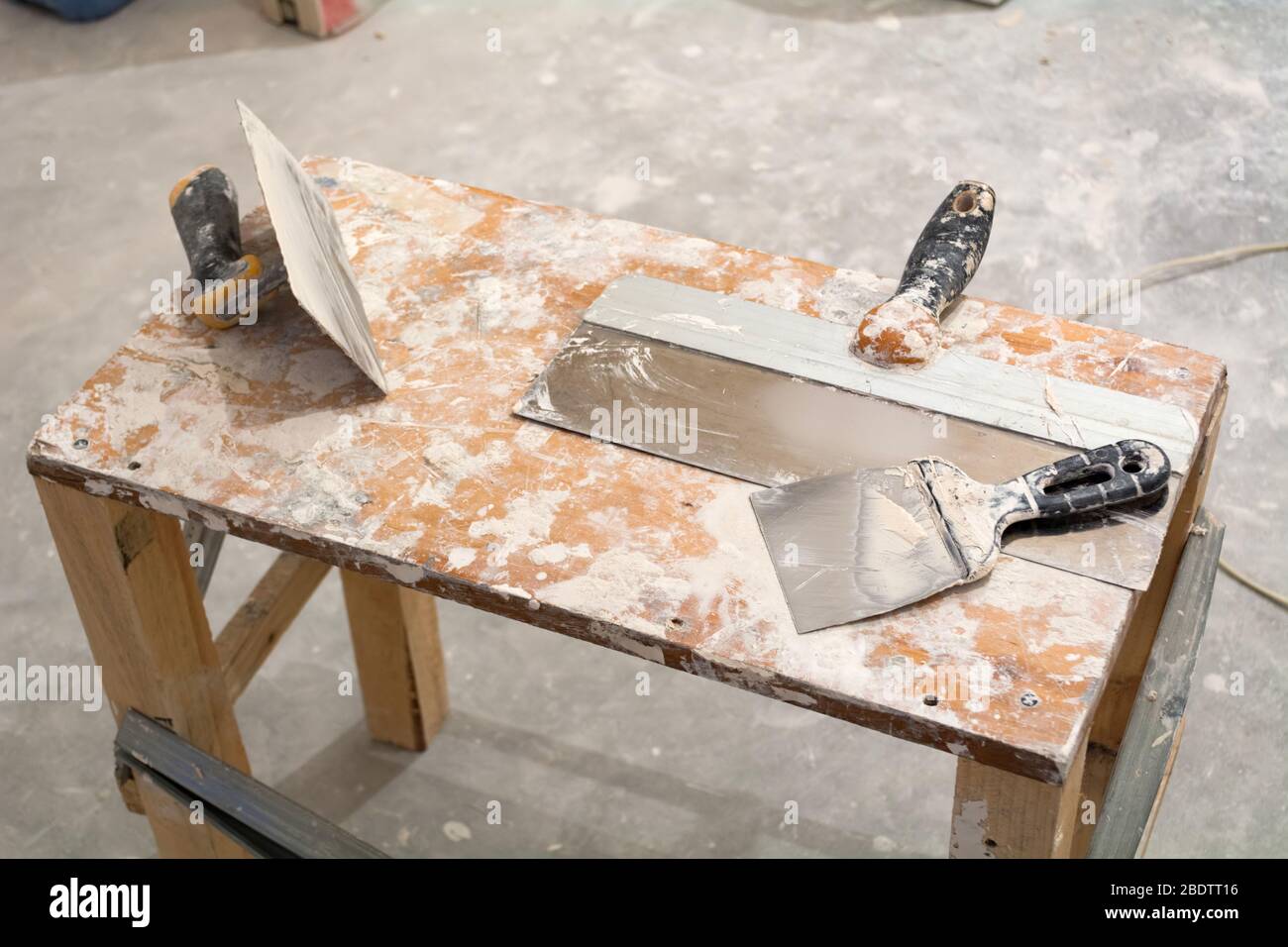Instruments for renovation apartment. Chisel, trowel, putty knife. The ...