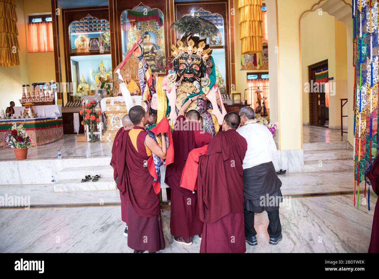 Tibetan monks preparing for Cham dance, performed during Losar (Tibetan ...