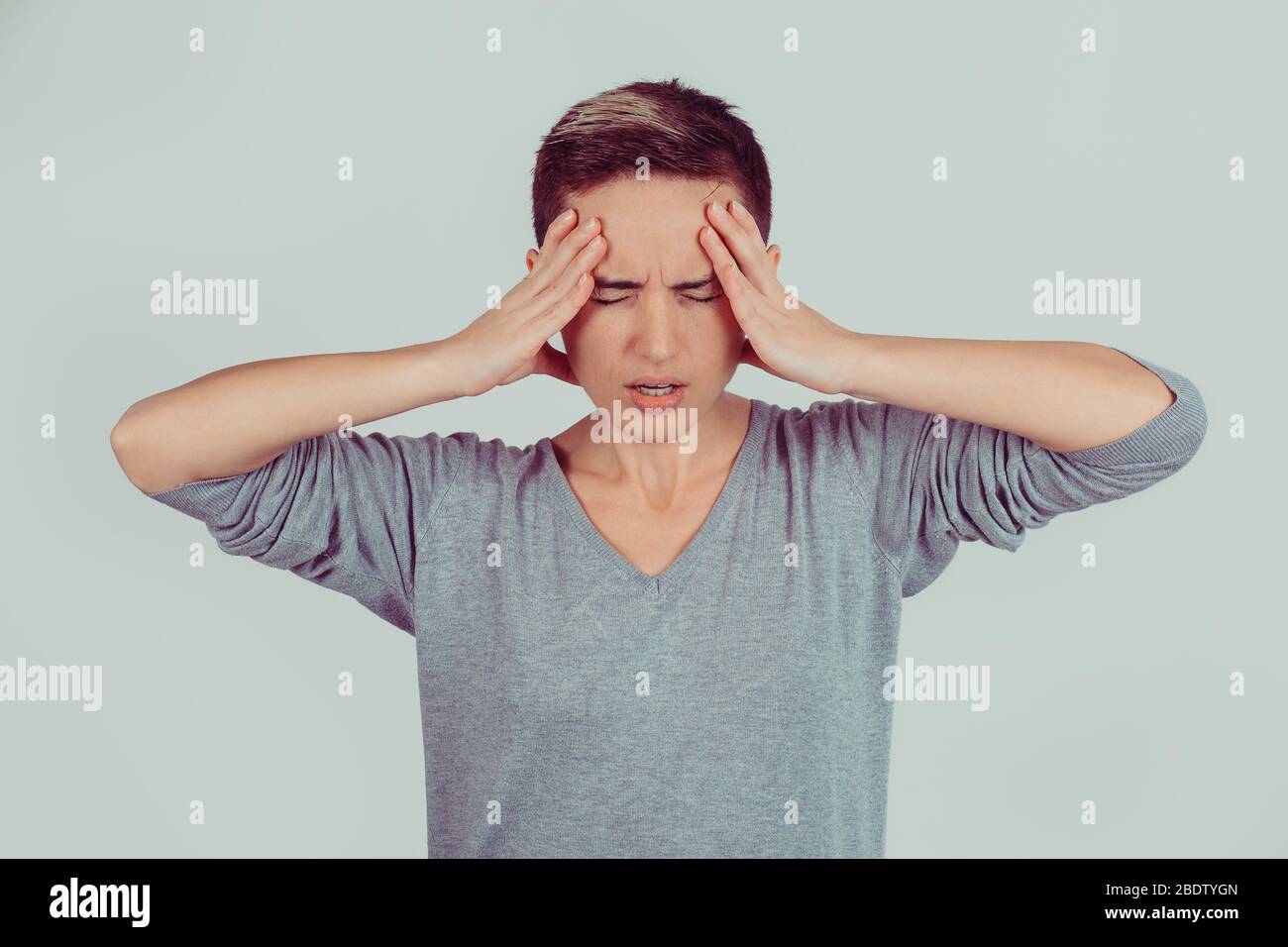 Stress. Closeup sad young woman with worried stressed face expression ...