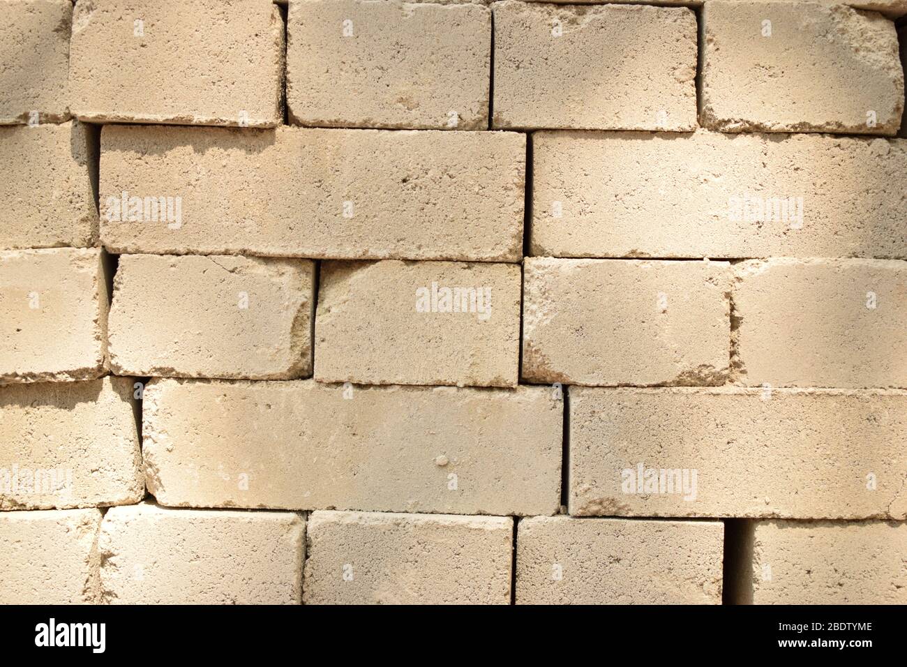 Concrete Cement Block bricks in stack for wall construction. Dirty Old ...