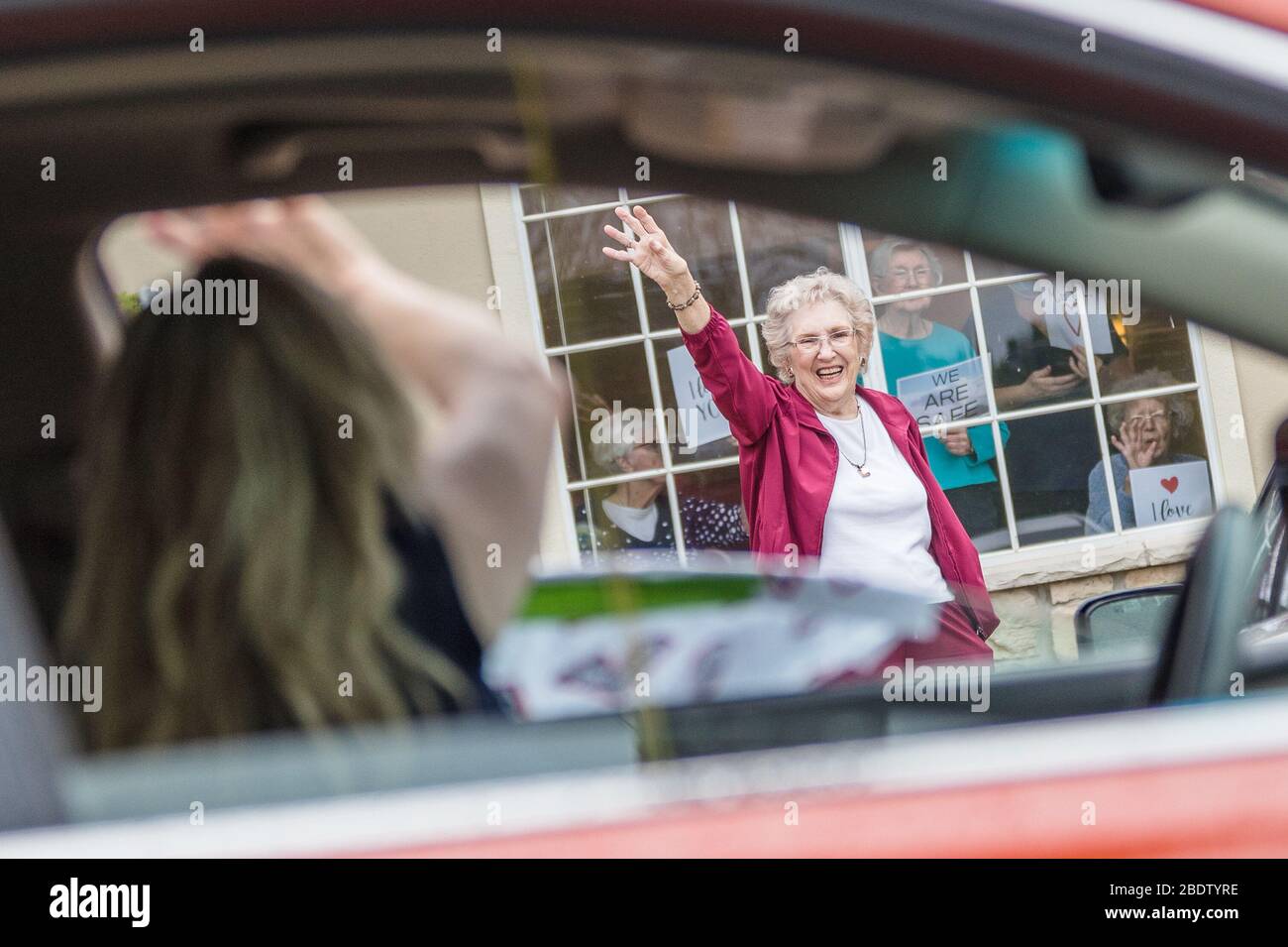 April 9, 2020: Retirement home residents wave and cheer as a drive-by ...