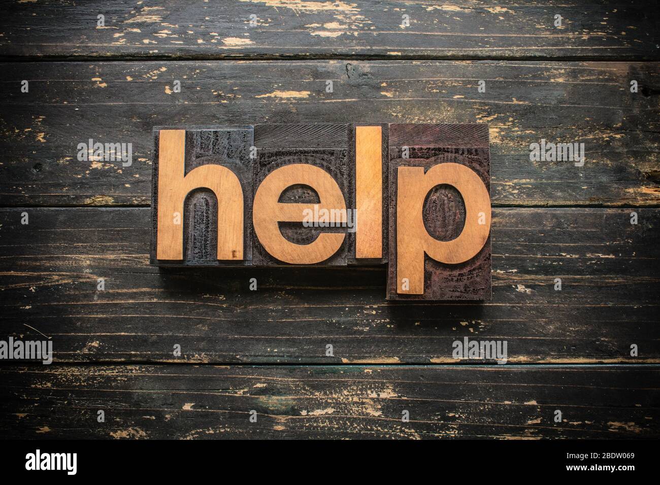 The word "HELP" written in vintage wood letterpress type on a vintage ...
