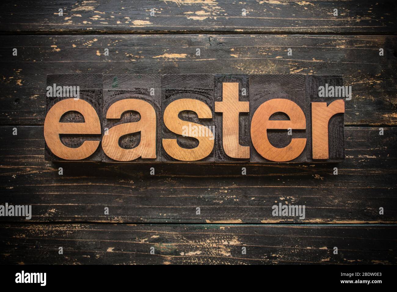 The word "EASTER" written in vintage wood letterpress type on a vintage ...