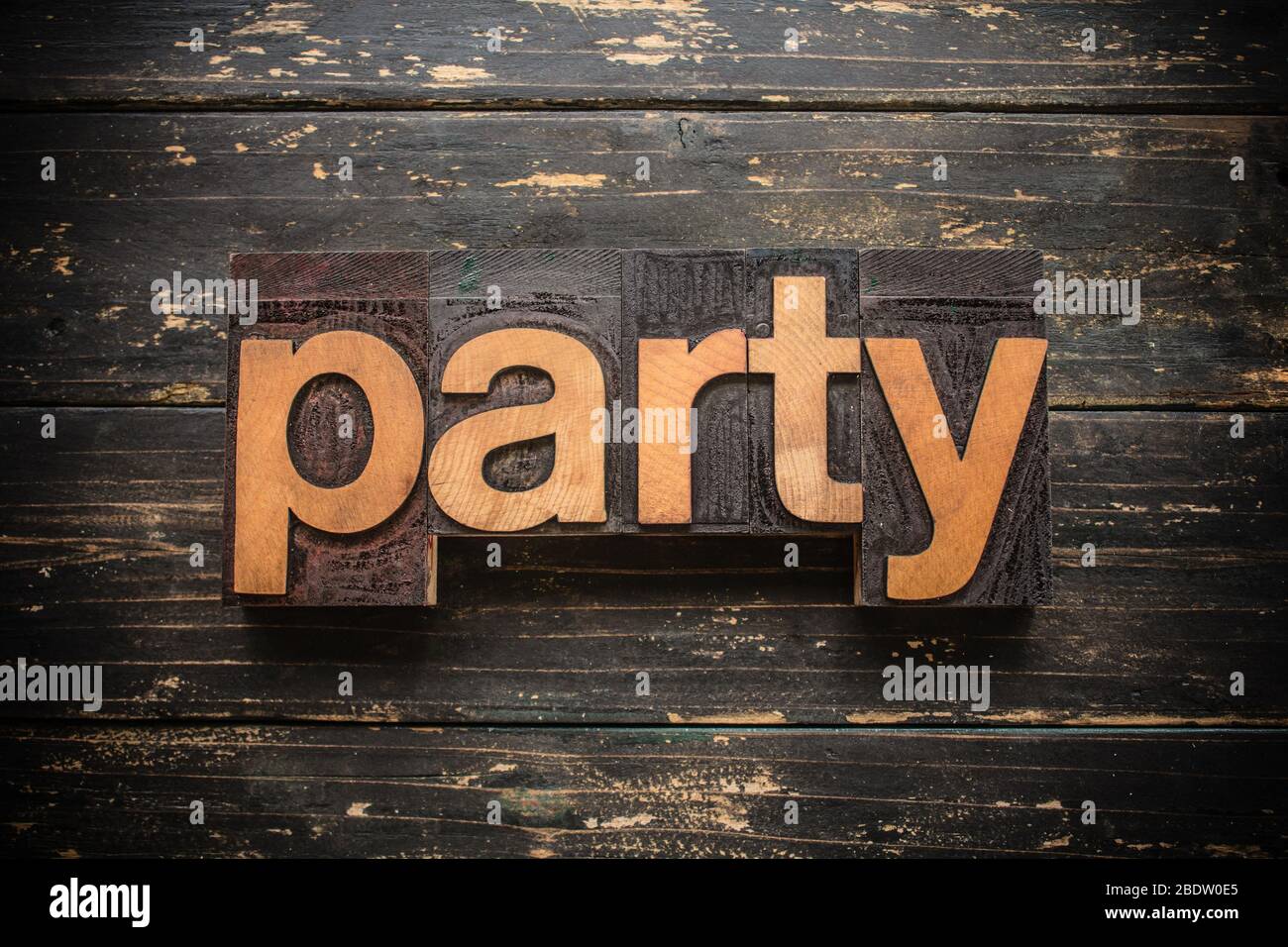 The word "PARTY" written in vintage wood letterpress type on a vintage ...