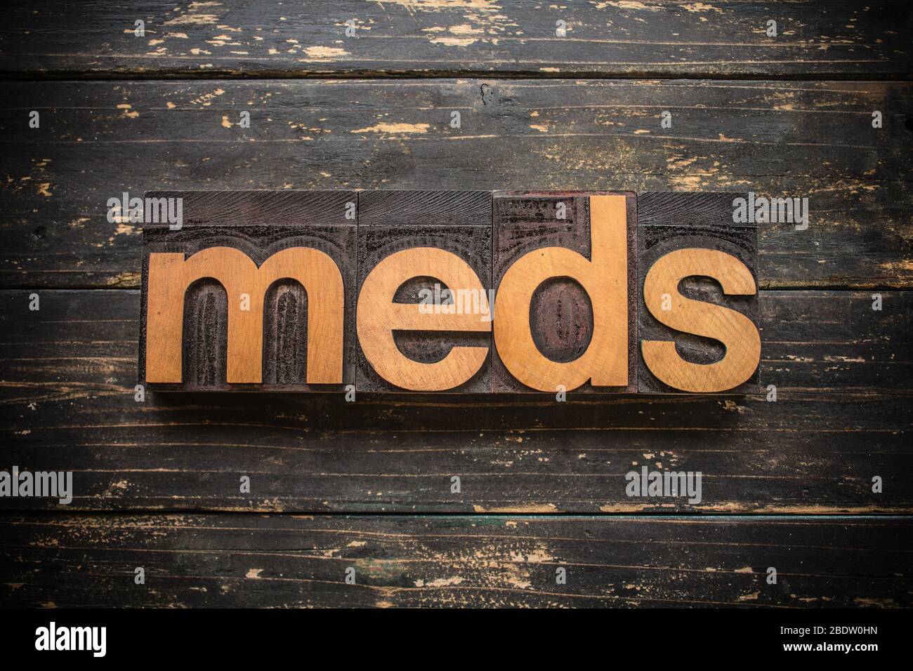 The word "MEDS" written in vintage wood letterpress type on a vintage ...