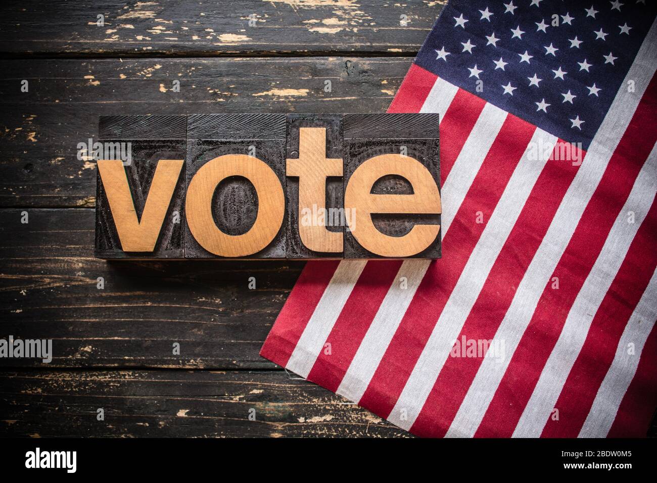 The word "VOTE" written in vintage wood letterpress type on a vintage ...