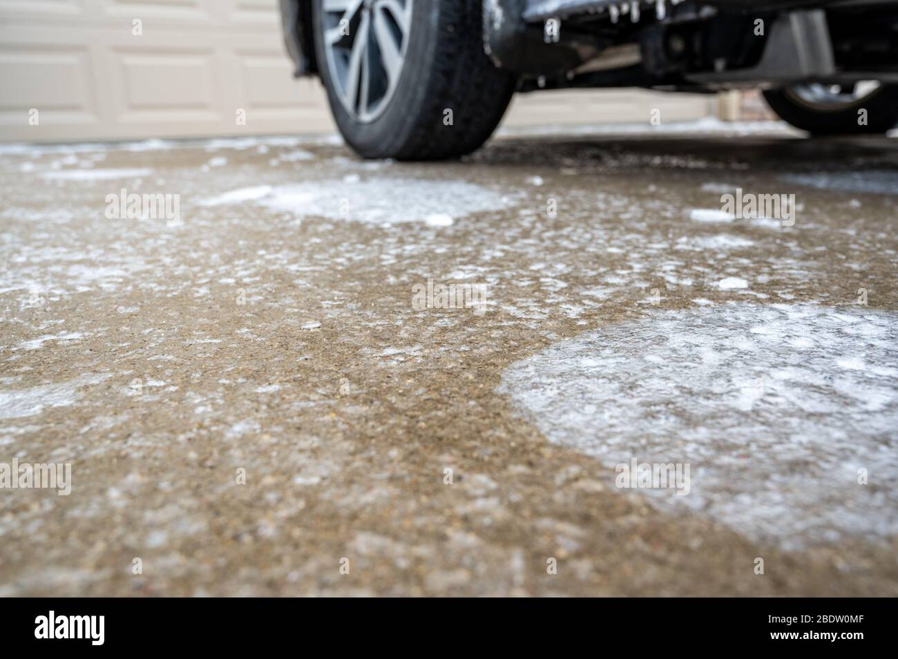 Freezing rain caused buildup of ice on concrete pavement and side ...