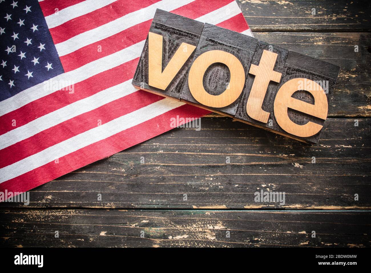 The word "VOTE" written in vintage wood letterpress type on a vintage ...