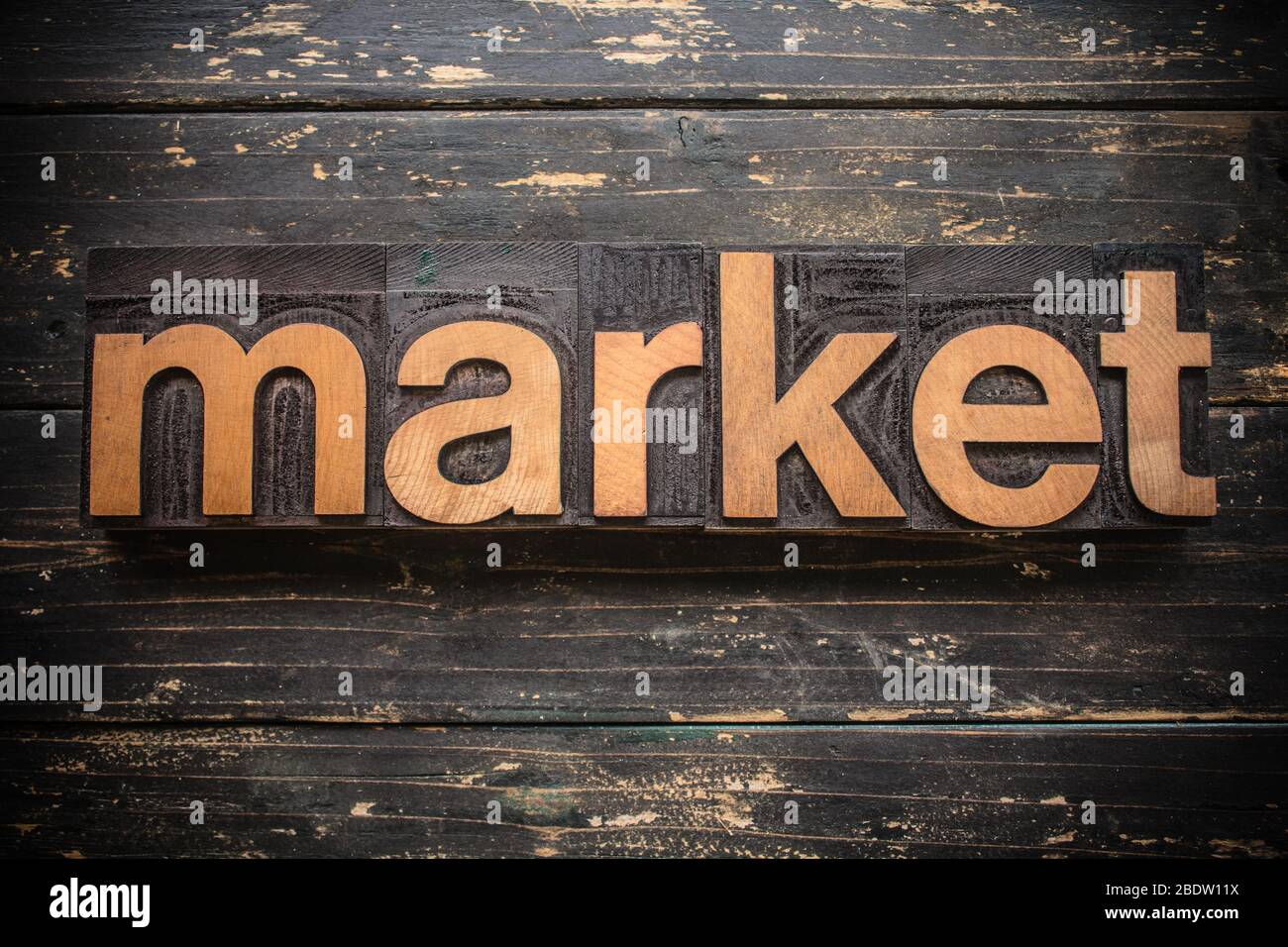 The word "MARKET" written in vintage wood letterpress type on a vintage ...