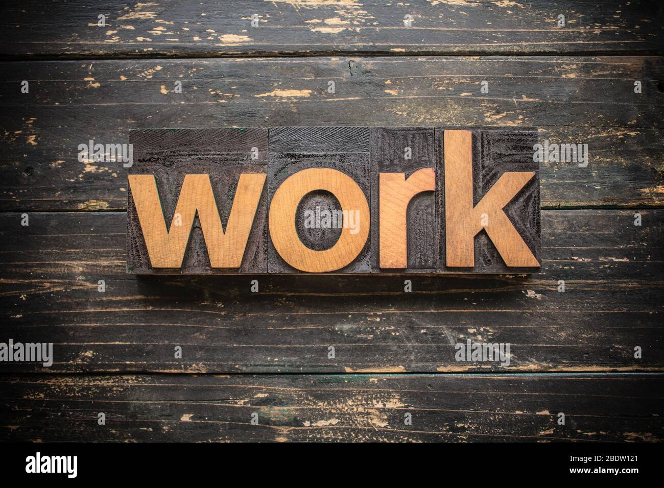 The word "WORK" written in vintage wood letterpress type on a vintage ...