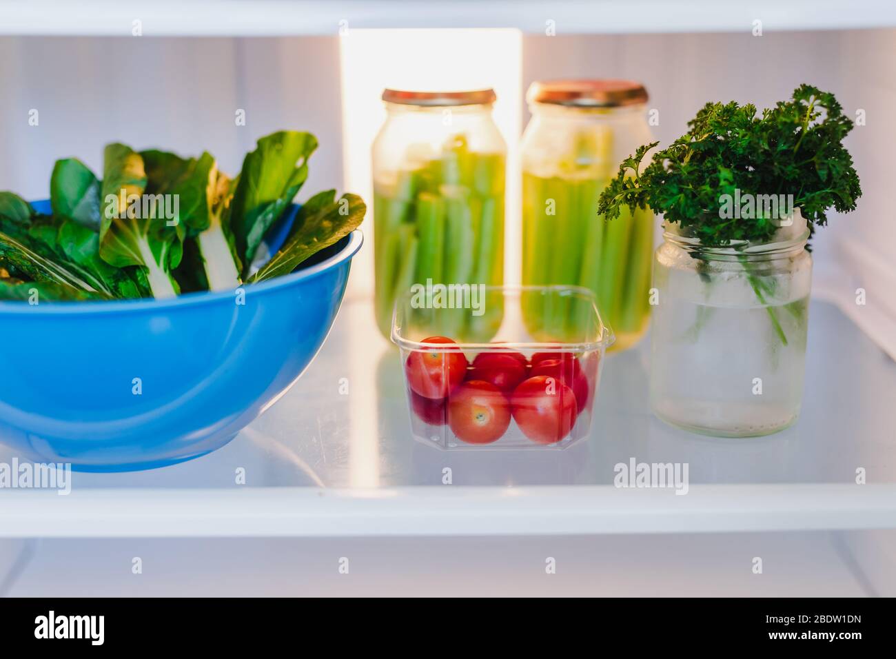 healthy plant-based food recipes concept, vegan fridge detail with ...