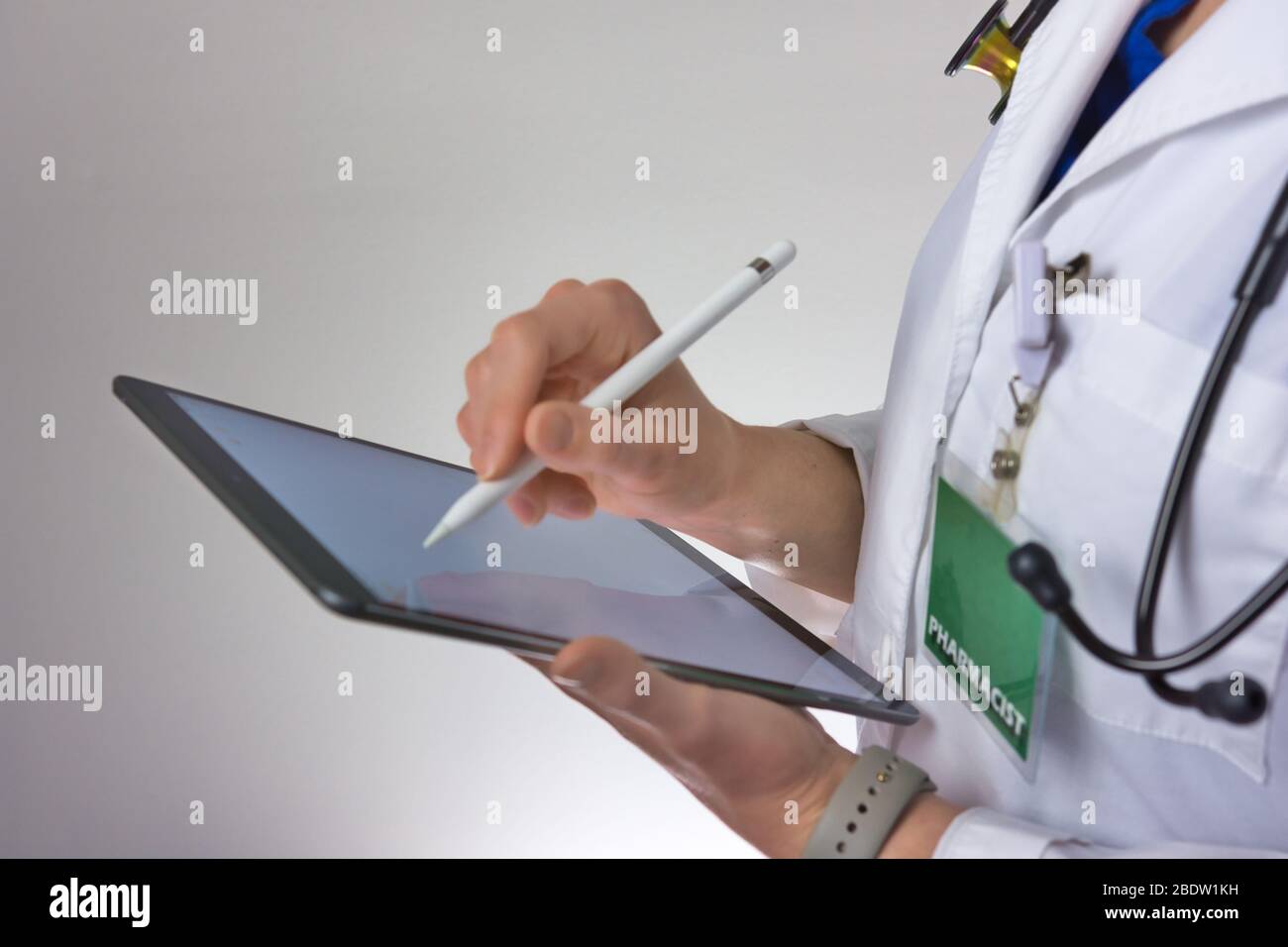 Healthcare worker using tablet to conduct healthcare. doctor or nurse ...