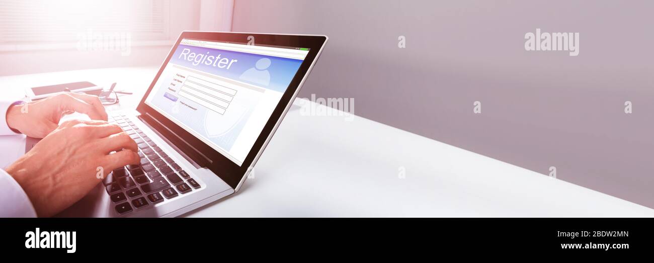 Filling Website Online Registration Form On Laptop Screen Stock Photo ...