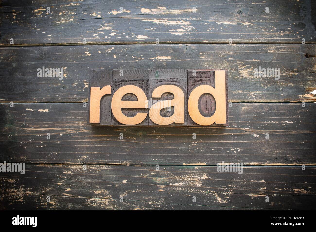 The word "READ" written in vintage wood letterpress type on a vintage ...