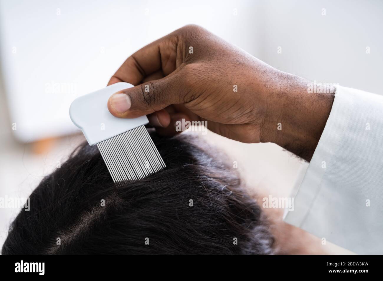 Head lice african hi-res stock photography and images - Alamy