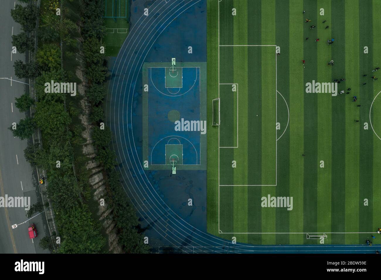 Aerial overhead shot of school football basketball field in Chongqing ...