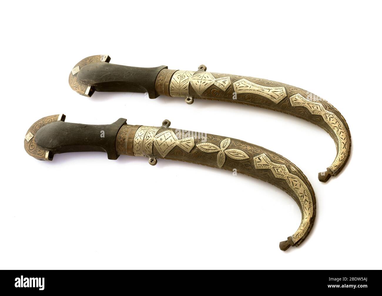 arab daggers in front of white background Stock Photo - Alamy