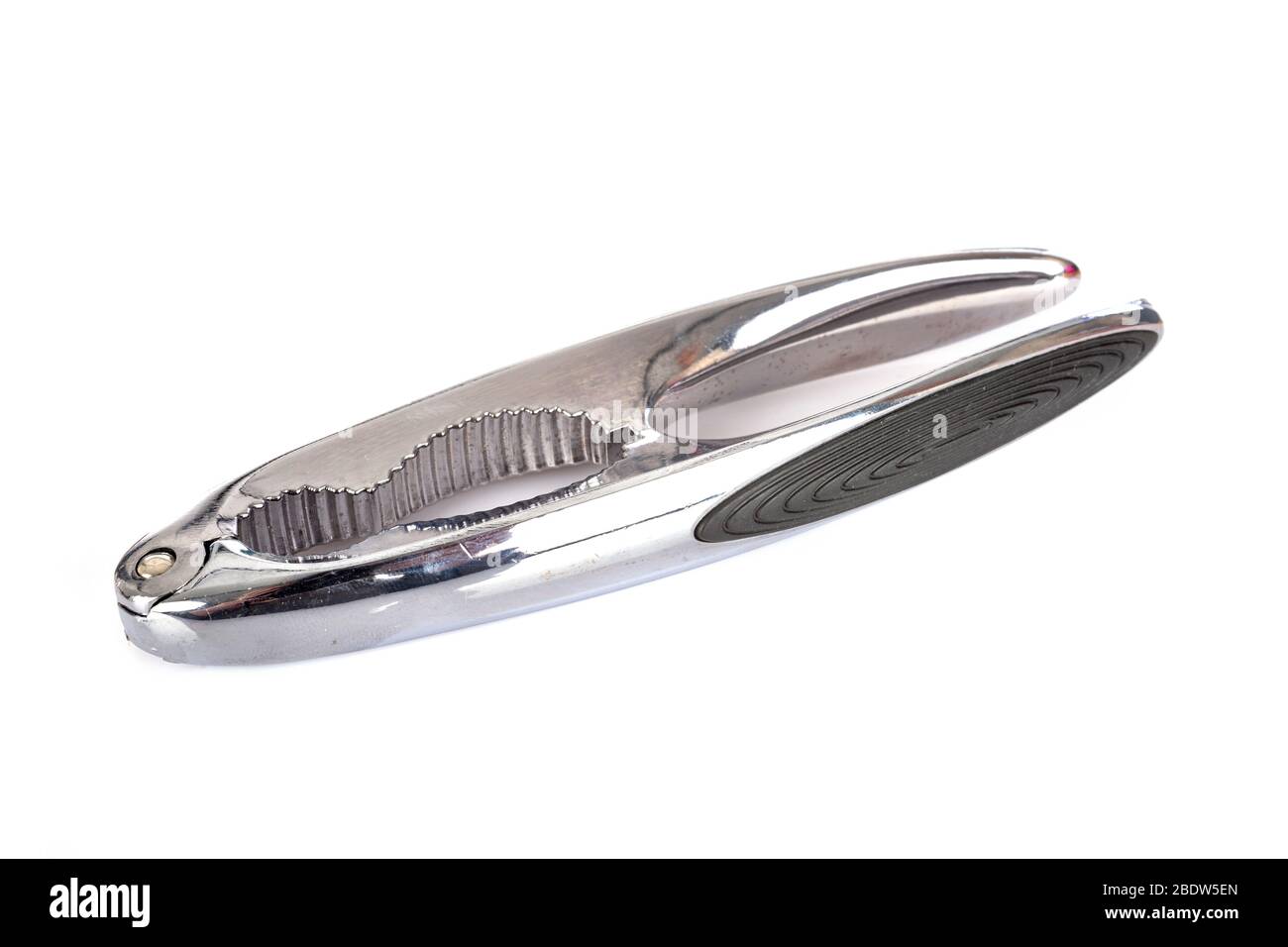 metallic nutcracker in front of white background Stock Photo - Alamy