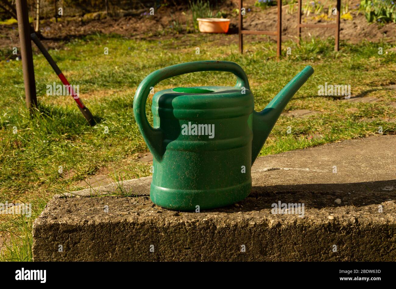 Green watering can, ax, garden things, time for garden work, chill ...