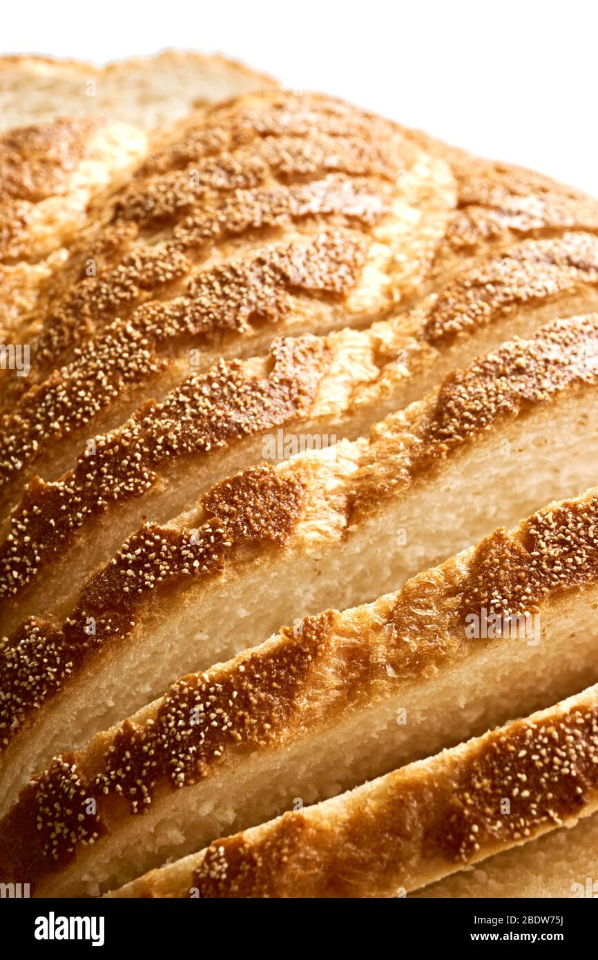 Slices of bread. Extreme closeup of freshly baked white sliced country ...