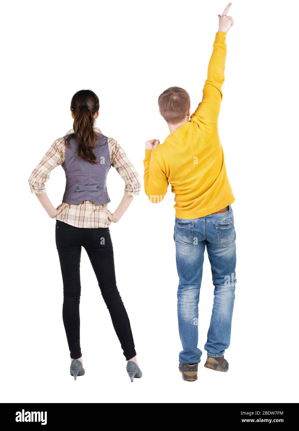Back view of couple in sweater pointing. Rear view people collection ...