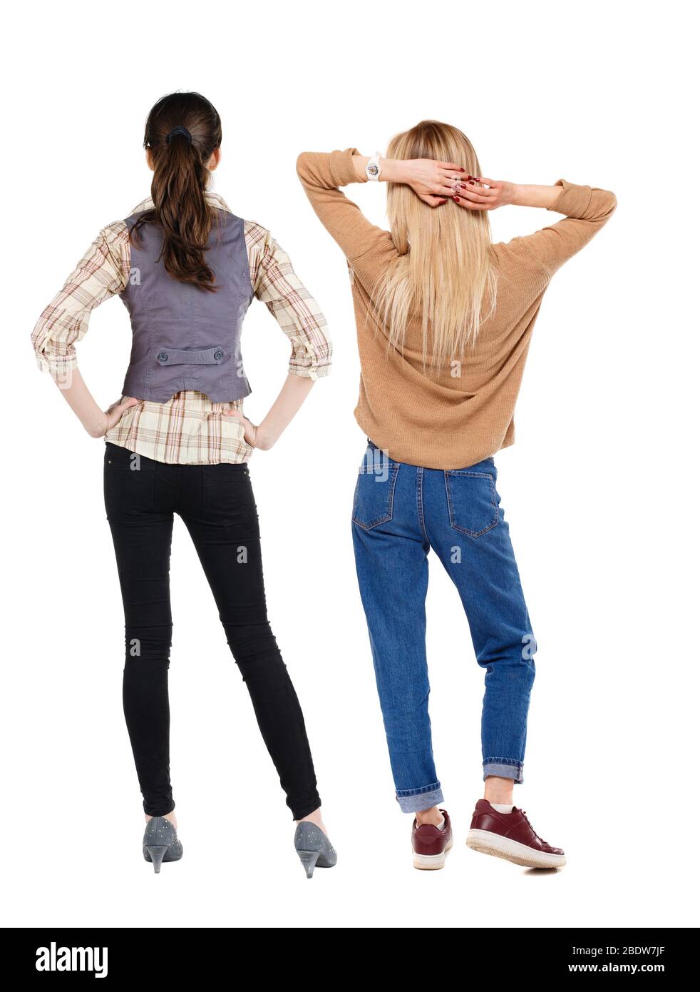 Back view of two woman in sweater. Rear view people collection ...