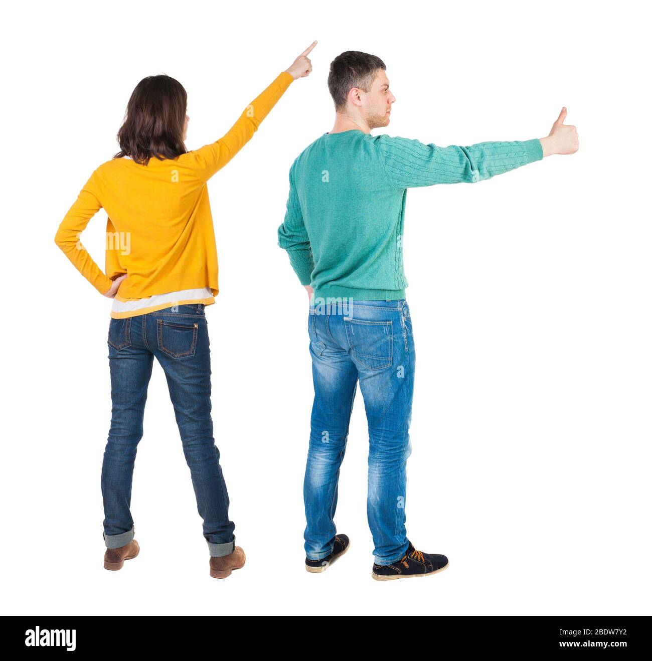 Back view of couple in sweater pointing. Rear view people collection ...