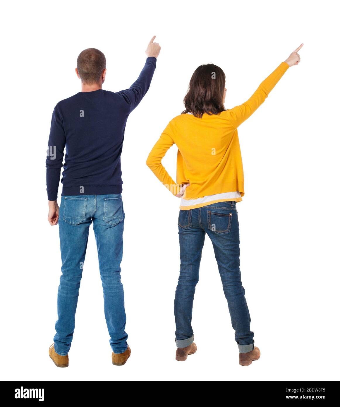 Back view of couple in sweater pointing. Rear view people collection ...