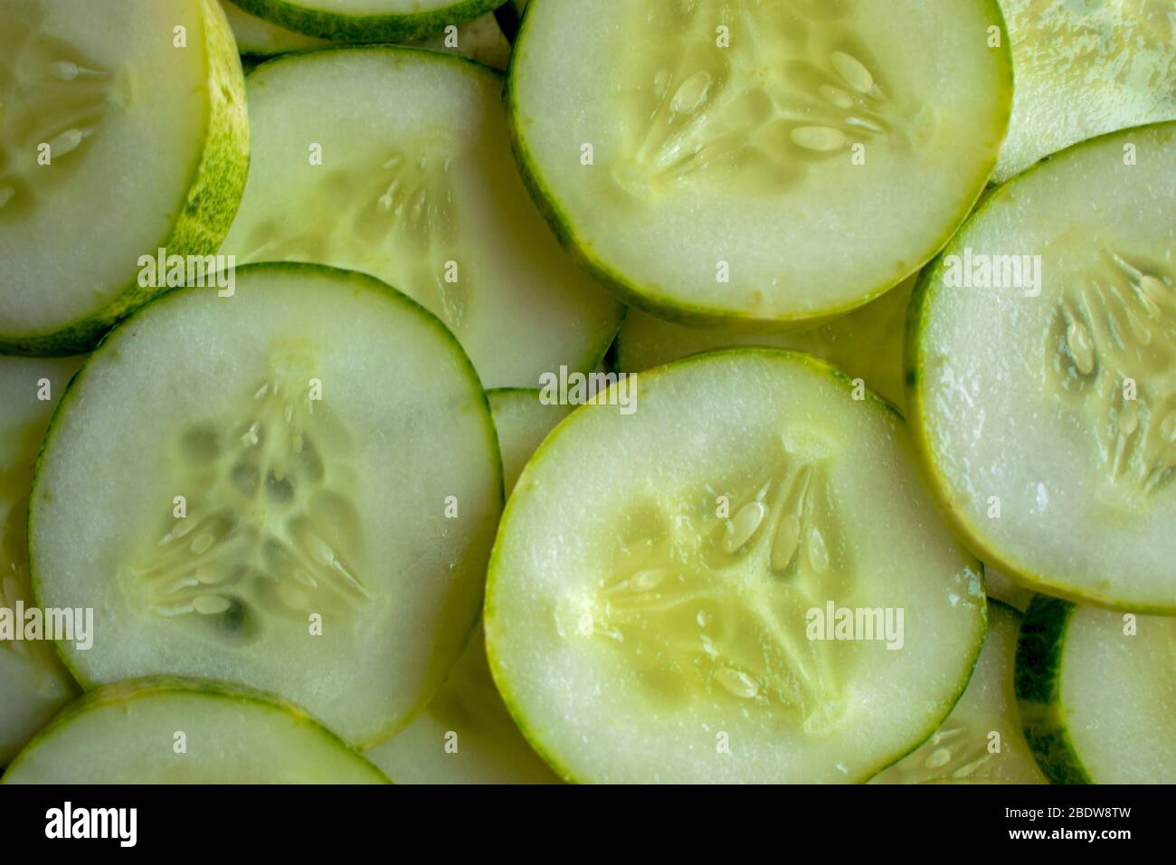 Fresh Cucumber Round Circle Slices As Whole background Texture Stock ...
