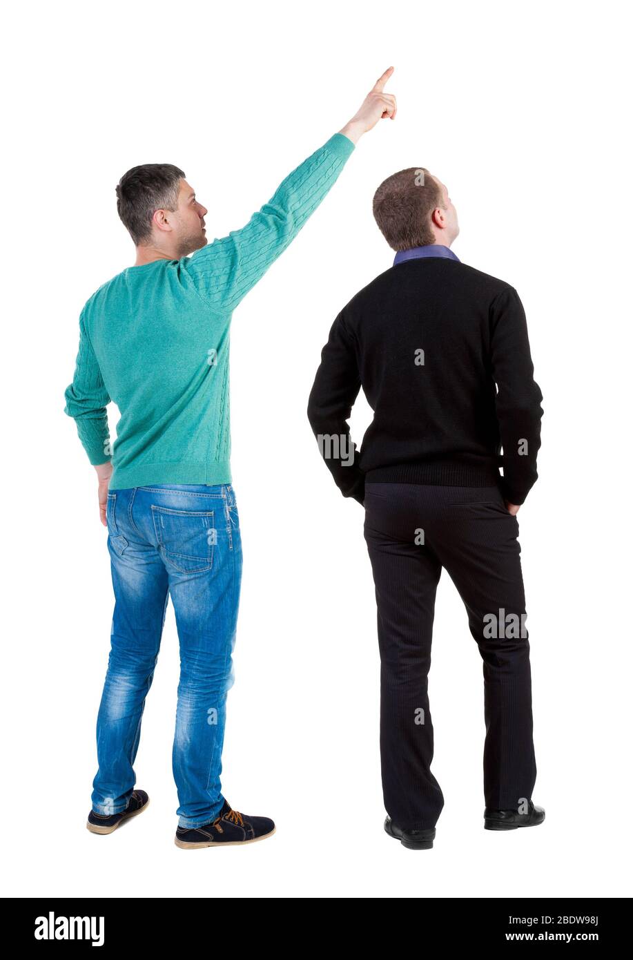 Back view of two man in sweater pointing. Rear view people collection ...