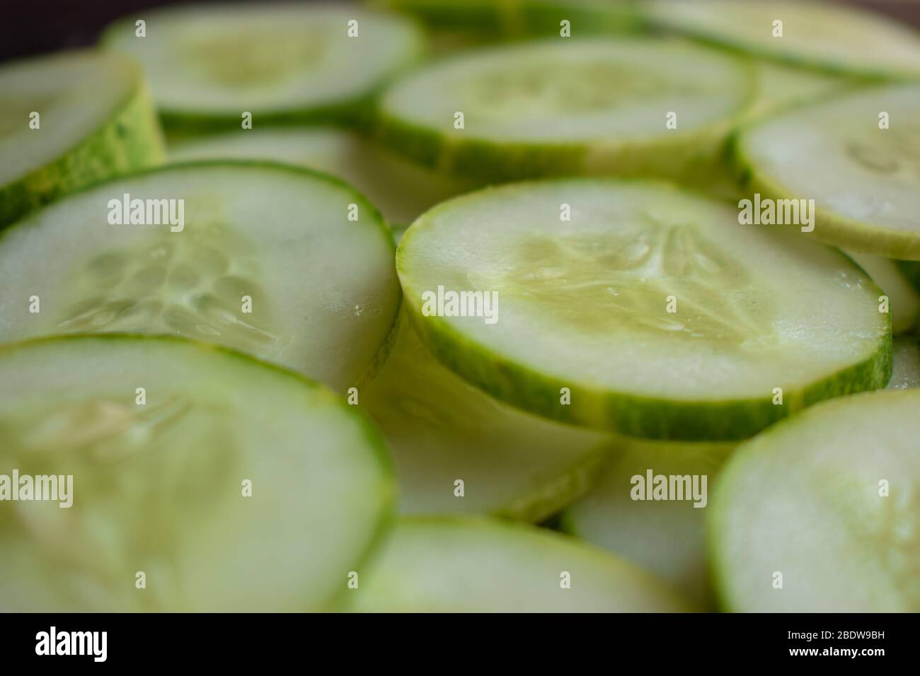 Fresh Cucumber Round Circle Slices As Whole background Texture Stock ...