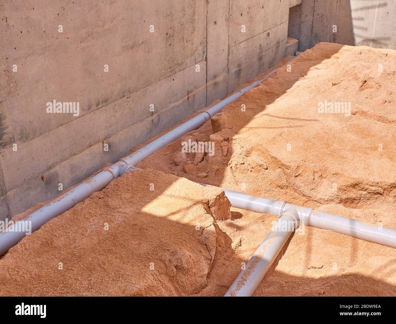 Junction of plastic sewer pipes. Sewage pipeline system of residential ...