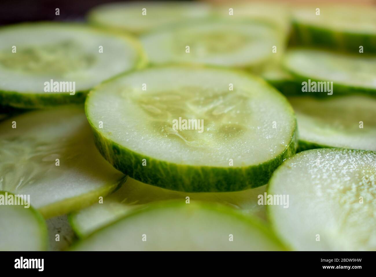 Fresh Cucumber Round Circle Slices As Whole background Texture Stock ...