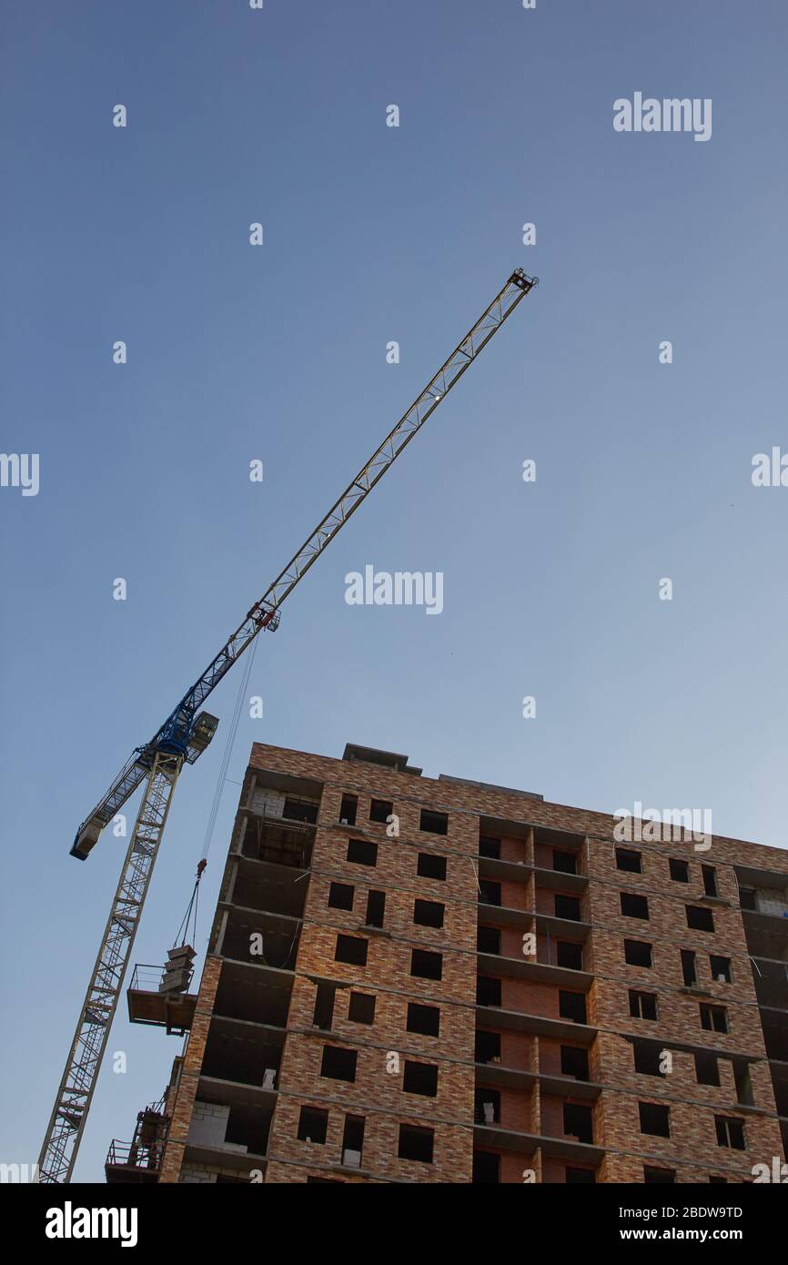 Industrial construction cranes the construction of an building Stock ...