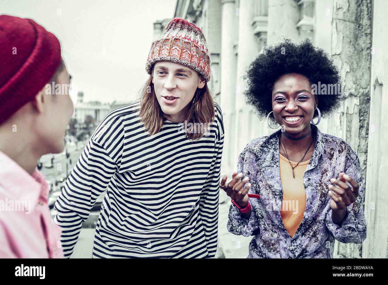 Joyful international female laughing at funny joke Stock Photo - Alamy
