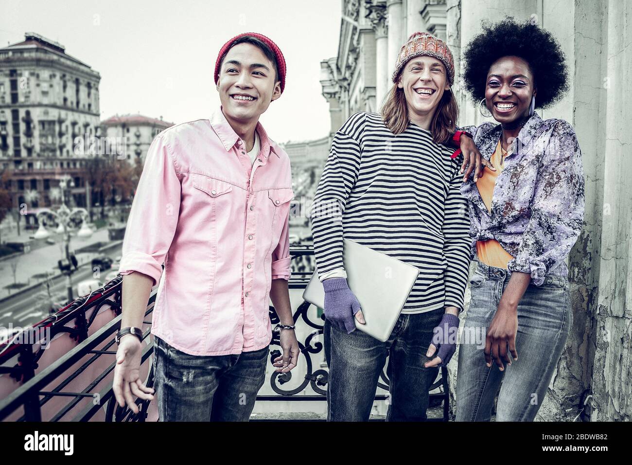 Positive delighted young people posing on camera Stock Photo - Alamy