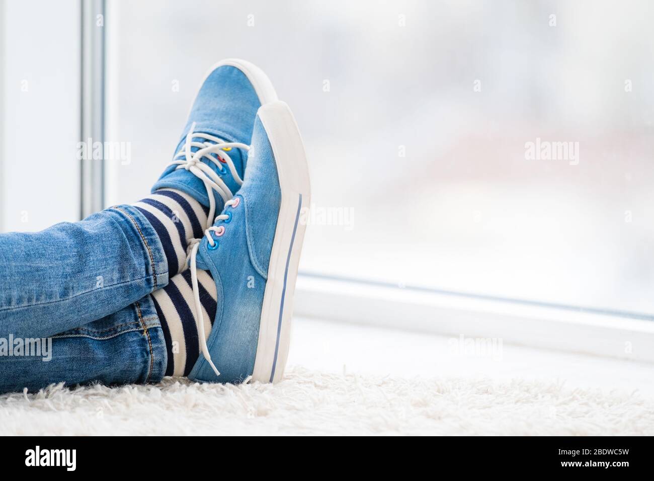 Woman in striped socks hi-res stock photography and images - Alamy