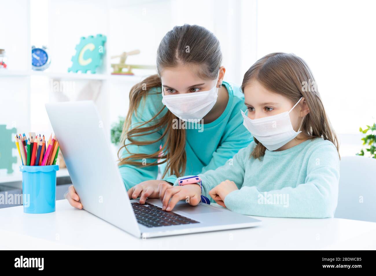 Girl studying using medical mask hi-res stock photography and images - Alamy