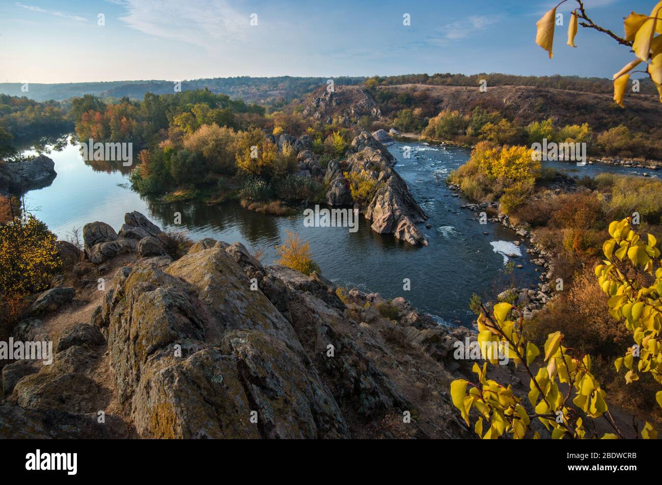 Granite-steppe lands of Bug landscape park in autumn. Integral rapid on ...